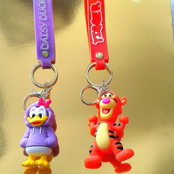 Disney | Accessories | Disney Tigger And Daisy Duck Silicone Gold Tone ...